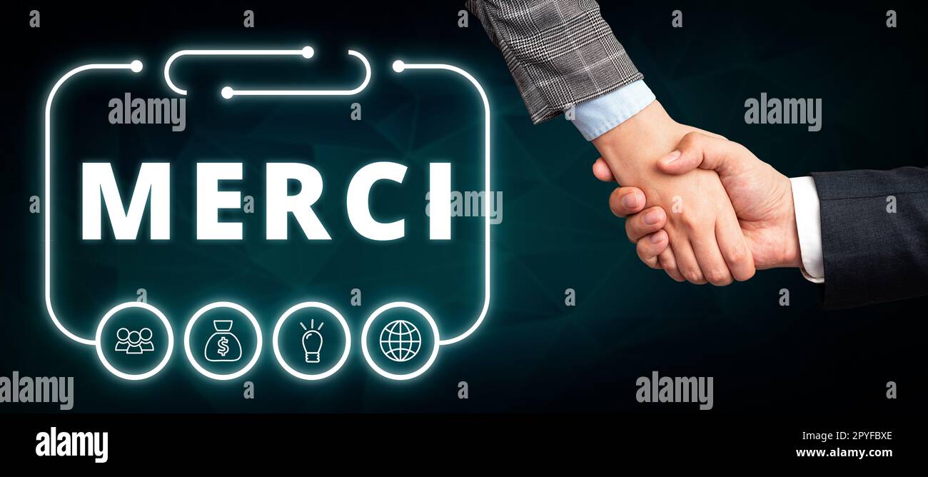 Sign displaying Merci. Business idea what is said or response when ...