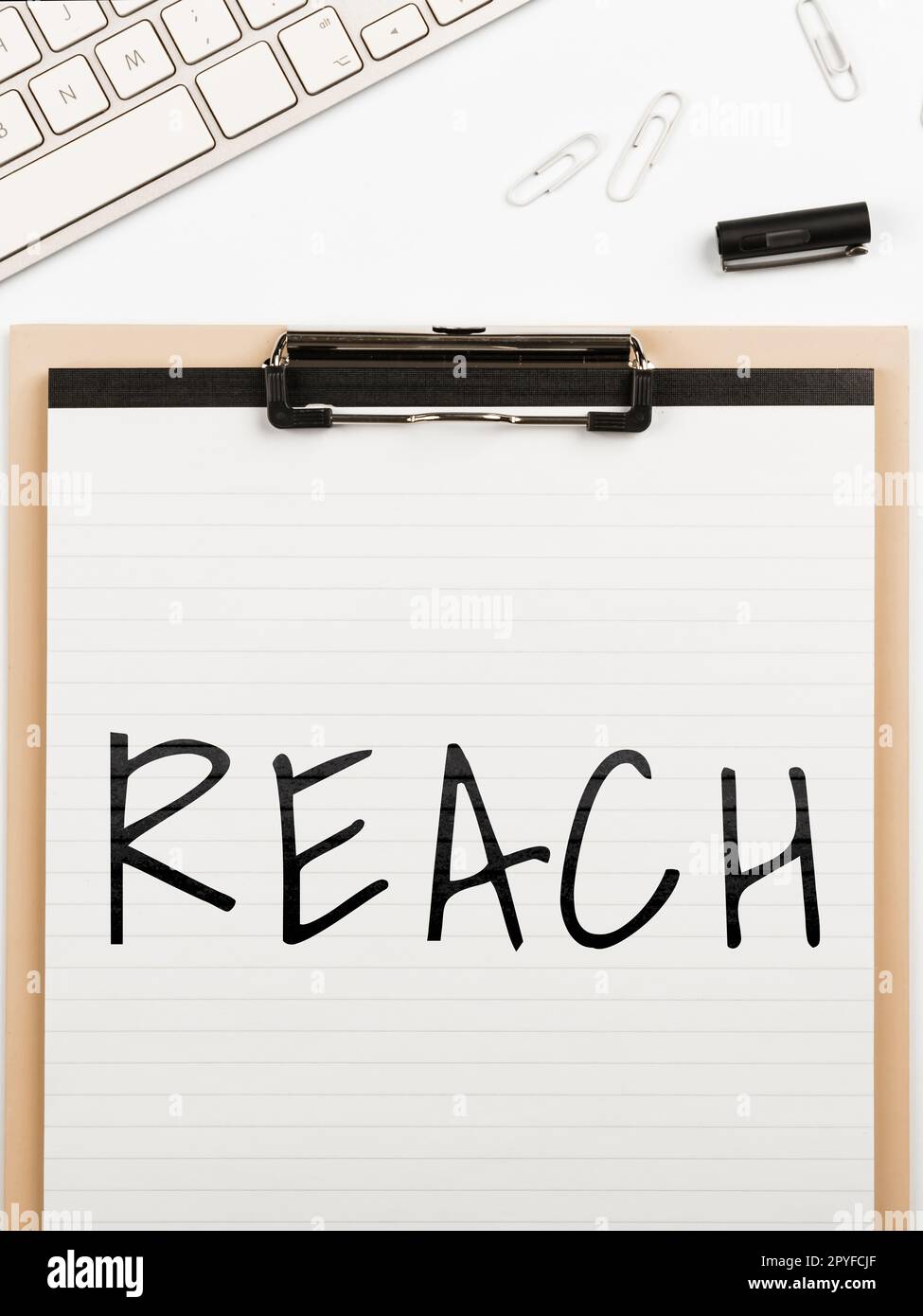 Hand writing sign Reach. Conceptual photo the distance within which ...