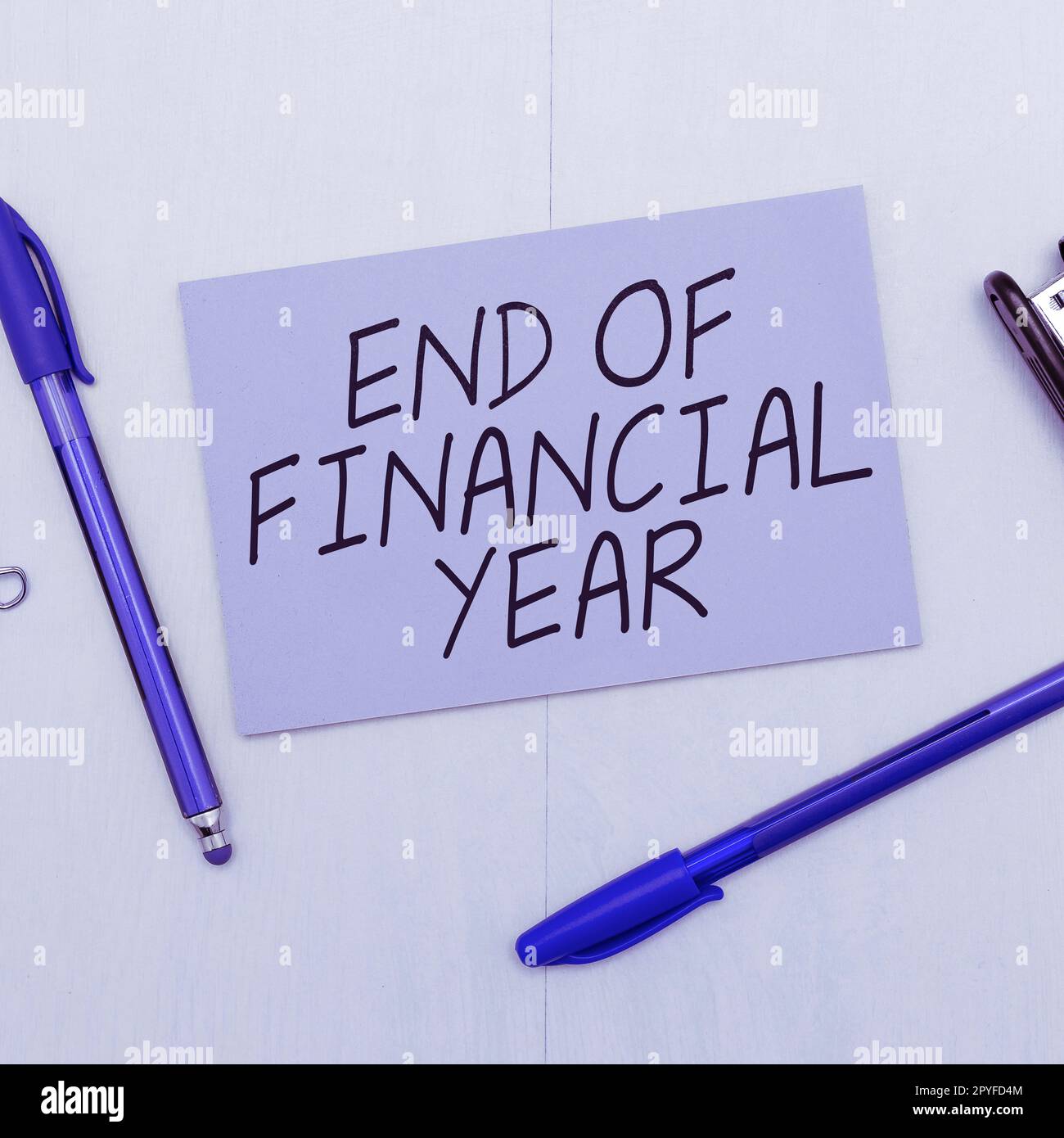 Hand writing sign End Of Financial Year. Conceptual photo Revise and ...