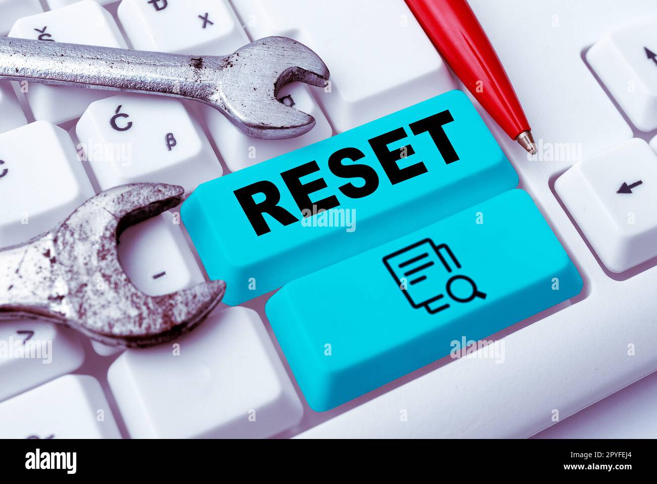 Hand writing sign Reset. Word for cause device return to its factory ...