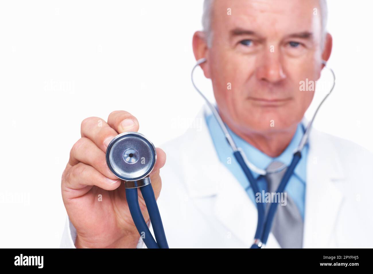 Doctor with stethoscope. Portrait of mature male doctor holding ...