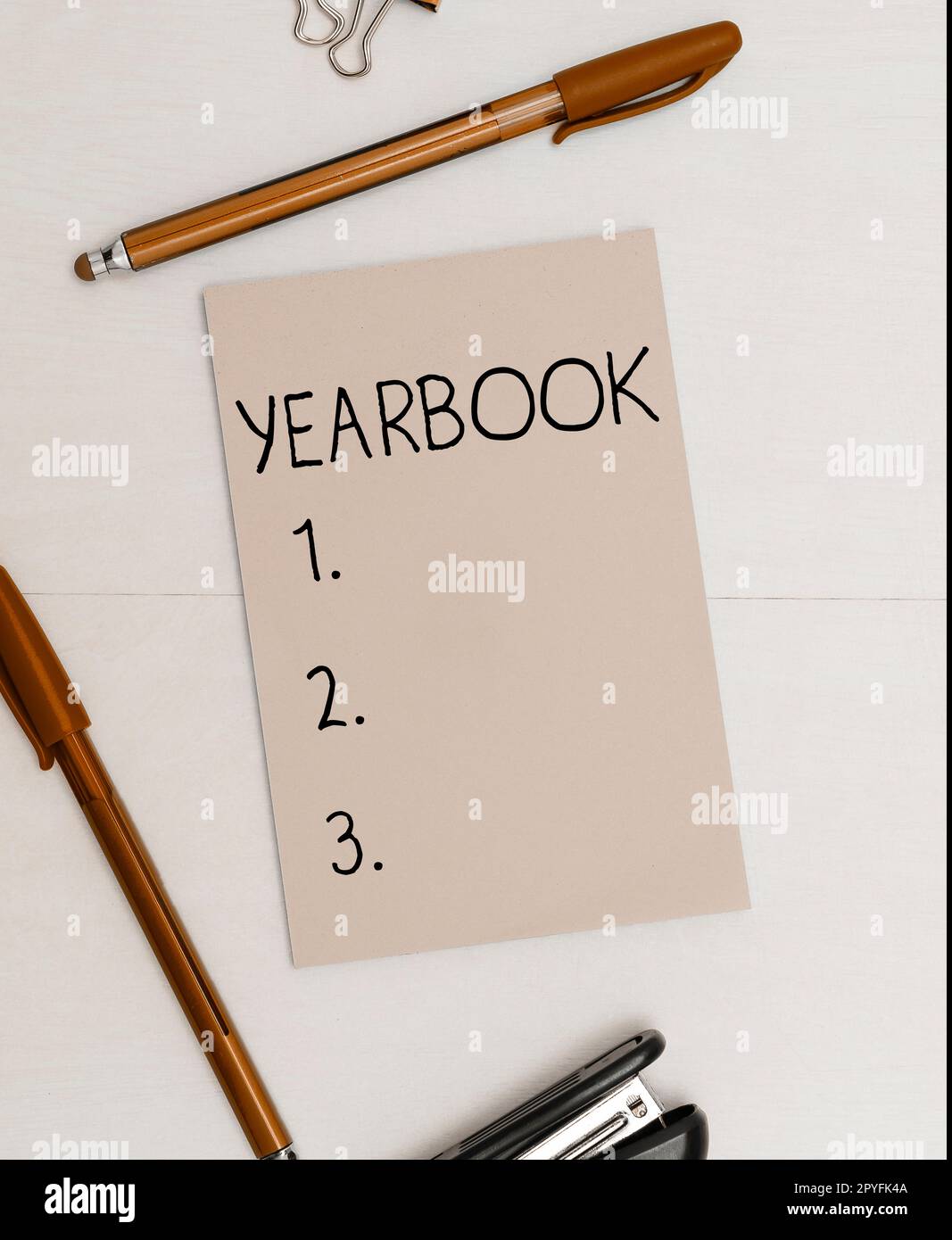 Text sign showing Yearbook. Word Written on publication compiled by ...