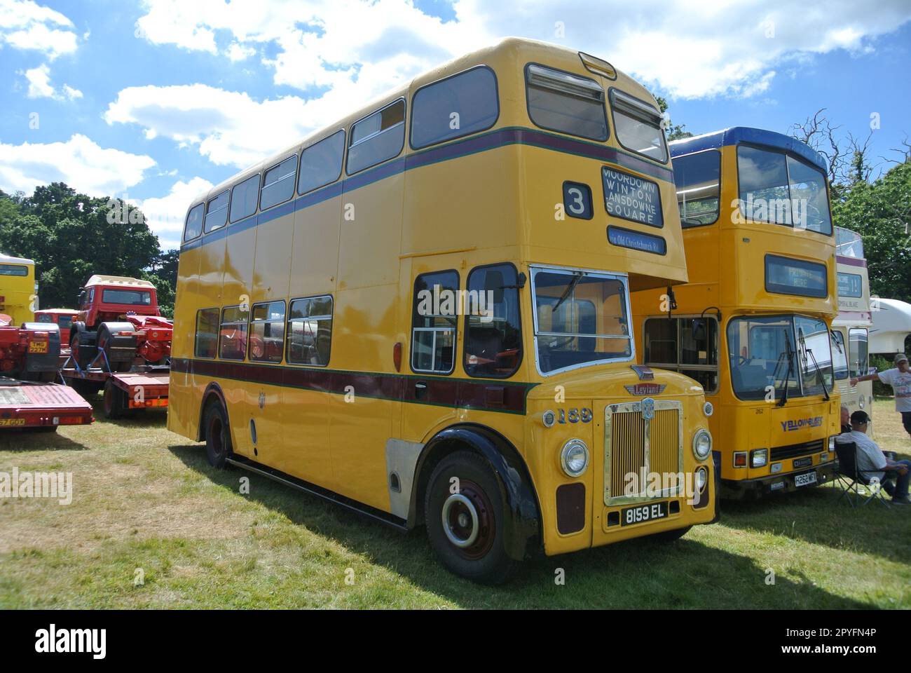 A 1960 Leyland Titan (left) and a 1955 Dennis Dominator (right) commercial buses parked on ...