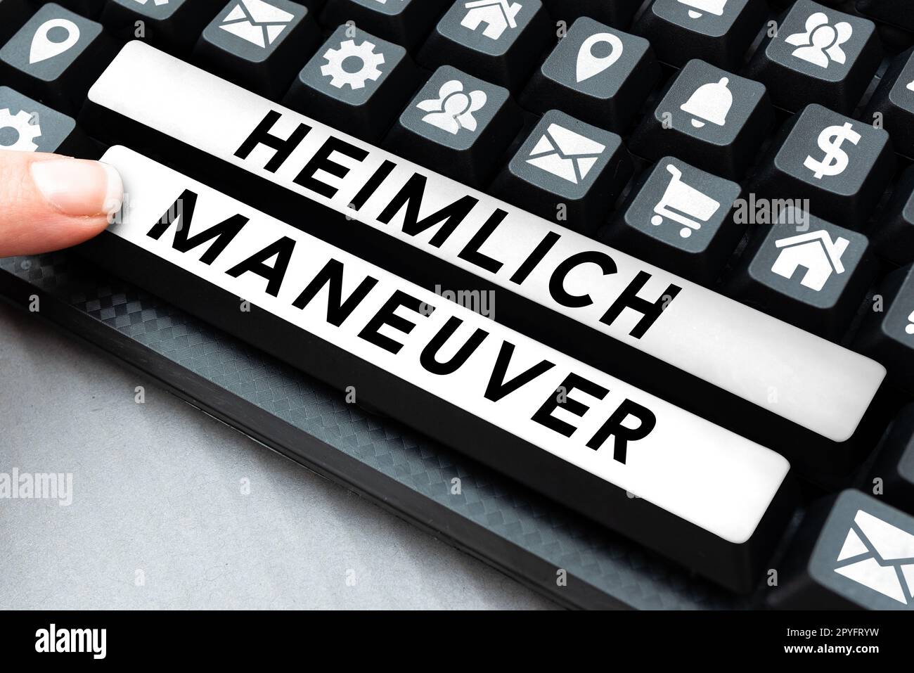 Hand writing sign Heimlich Maneuver. Conceptual photo application of ...