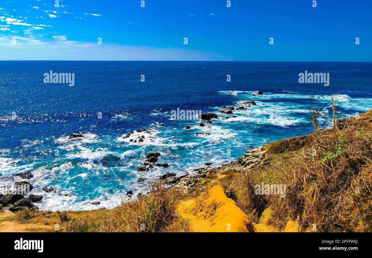 Beautiful rocks cliffs view waves at beach Puerto Escondido Mexico ...