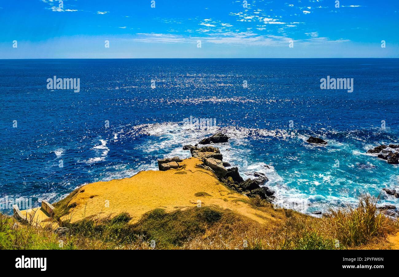 Beautiful rocks cliffs view waves at beach Puerto Escondido Mexico ...