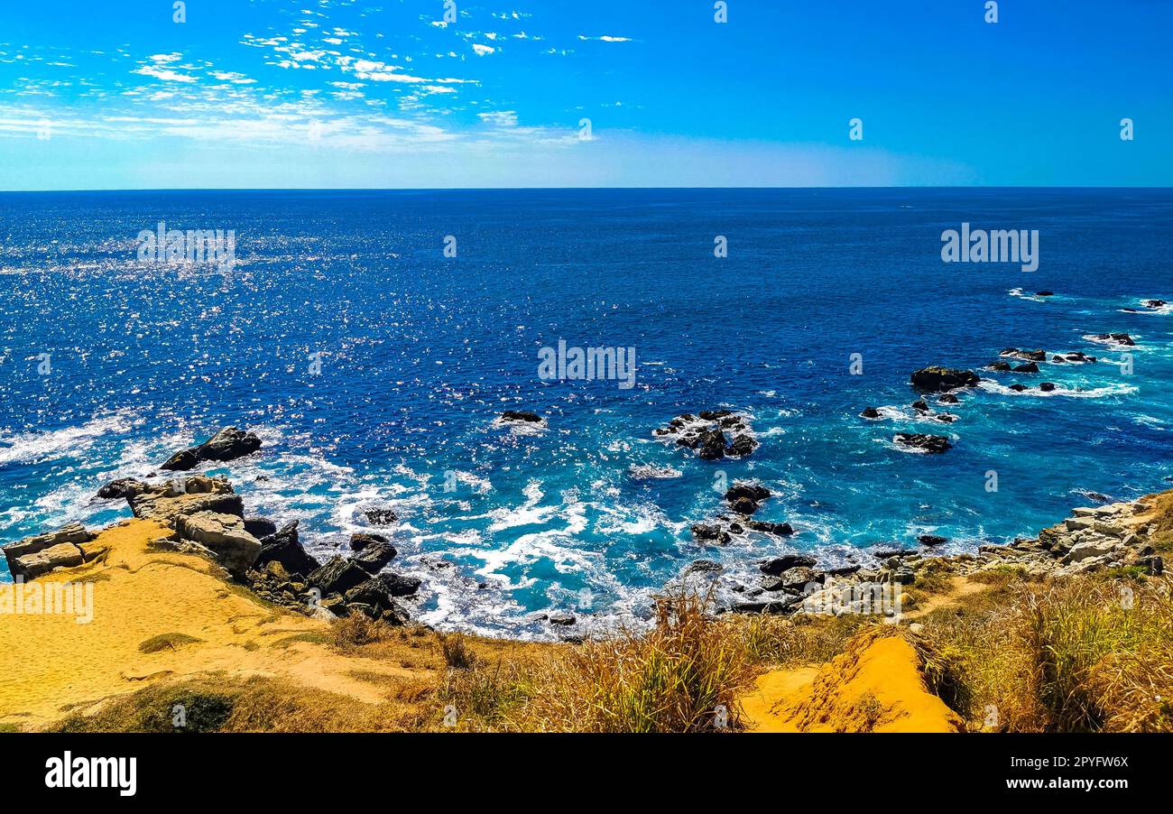 Beautiful rocks cliffs view waves at beach Puerto Escondido Mexico ...