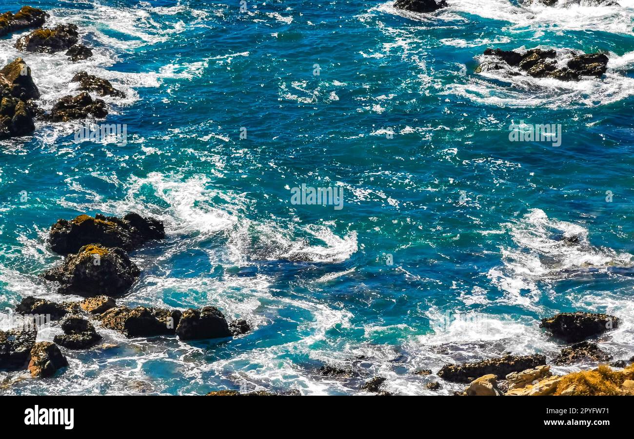 Beautiful rocks cliffs view waves at beach Puerto Escondido Mexico ...