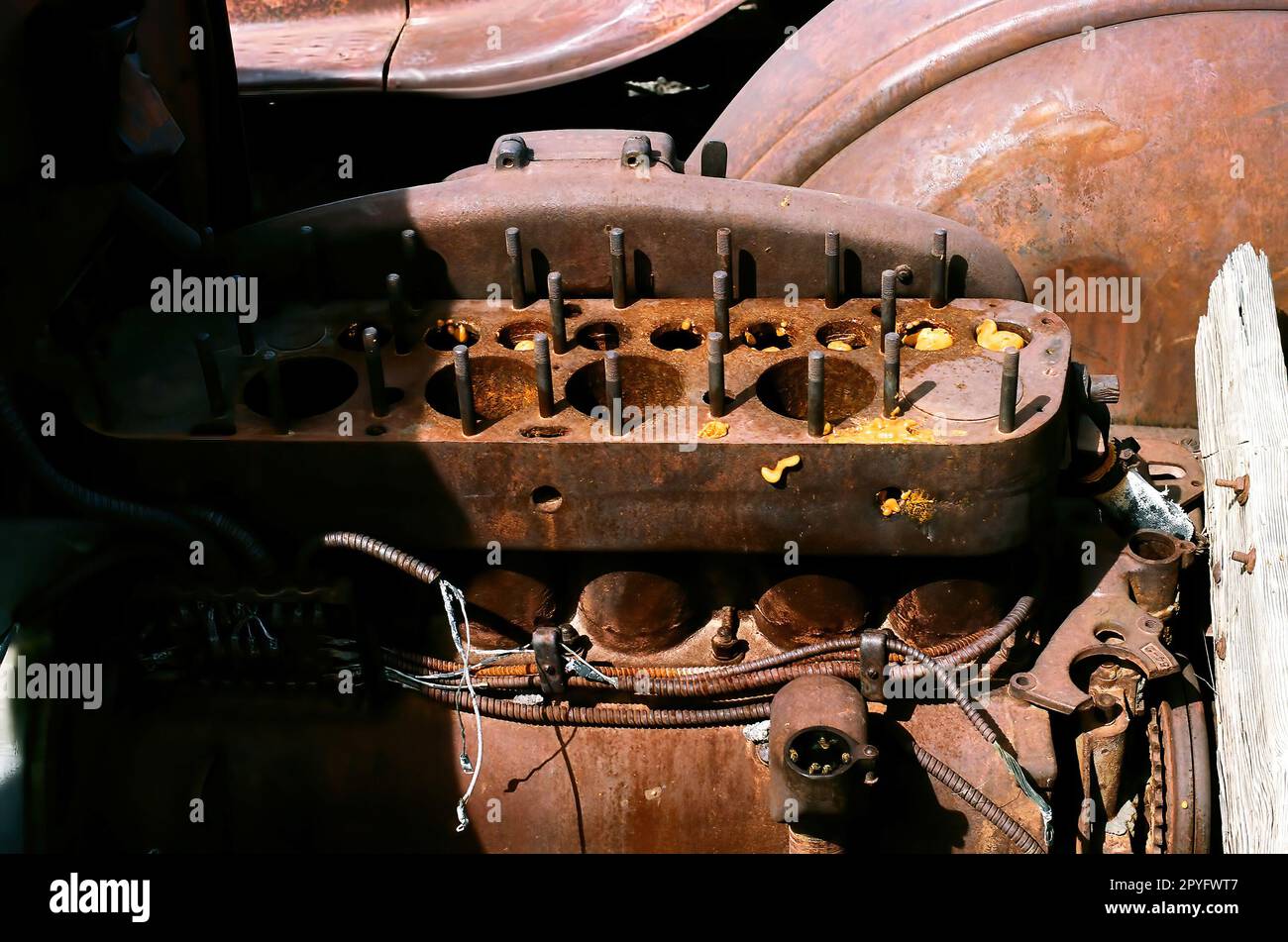 An old, abandoned, and rusty six cylinder pickup truck engine Stock ...