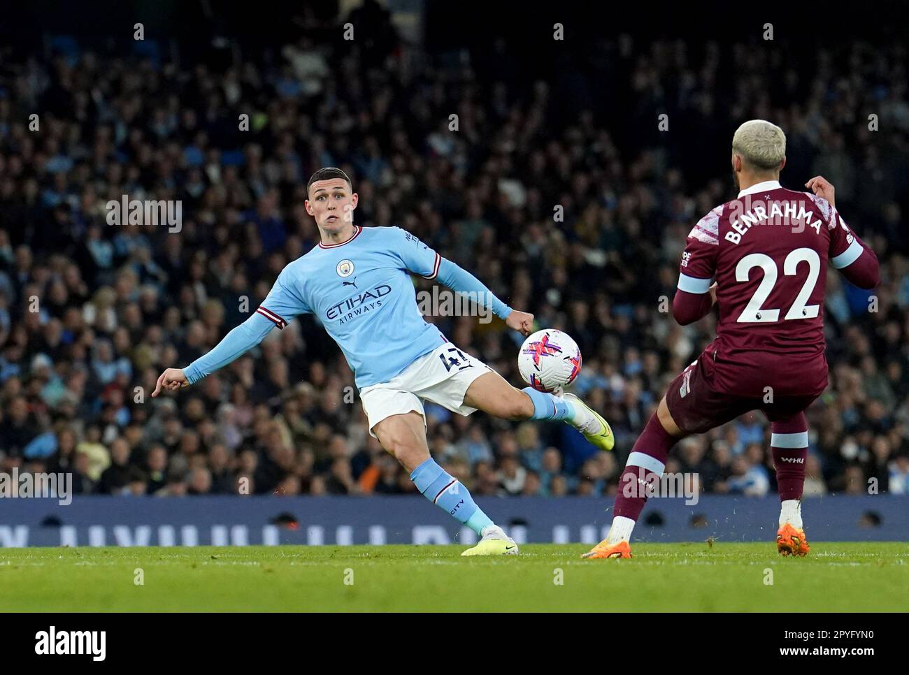 Manchester City's Phil Foden scores their side's third goal of the game ...