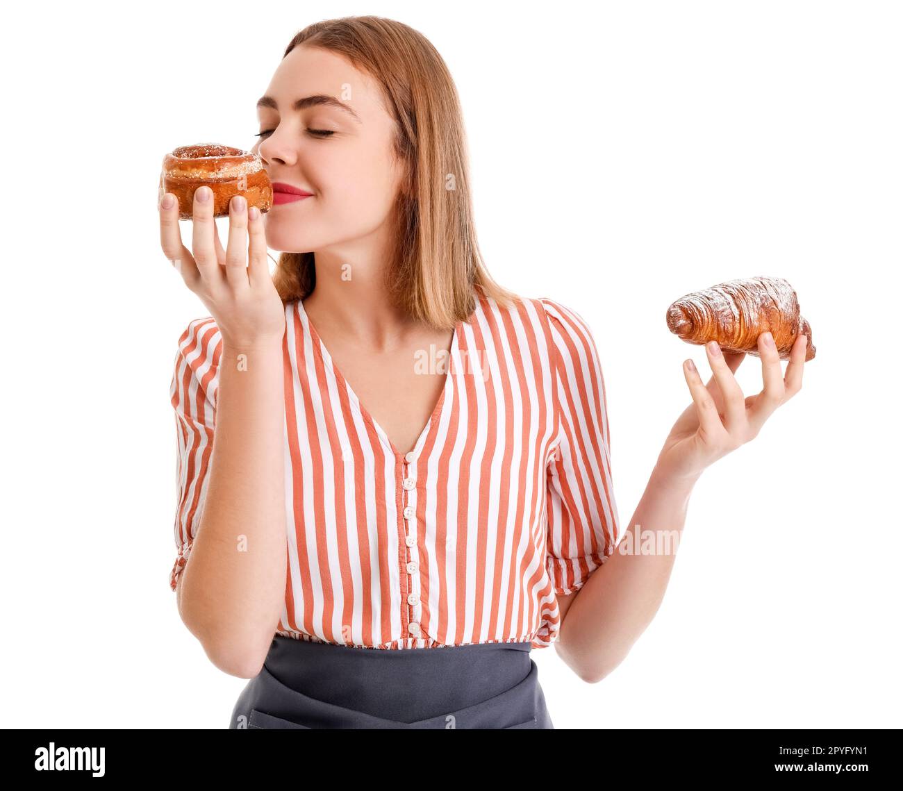 Female baker with tasty croissant and bun on white background Stock ...
