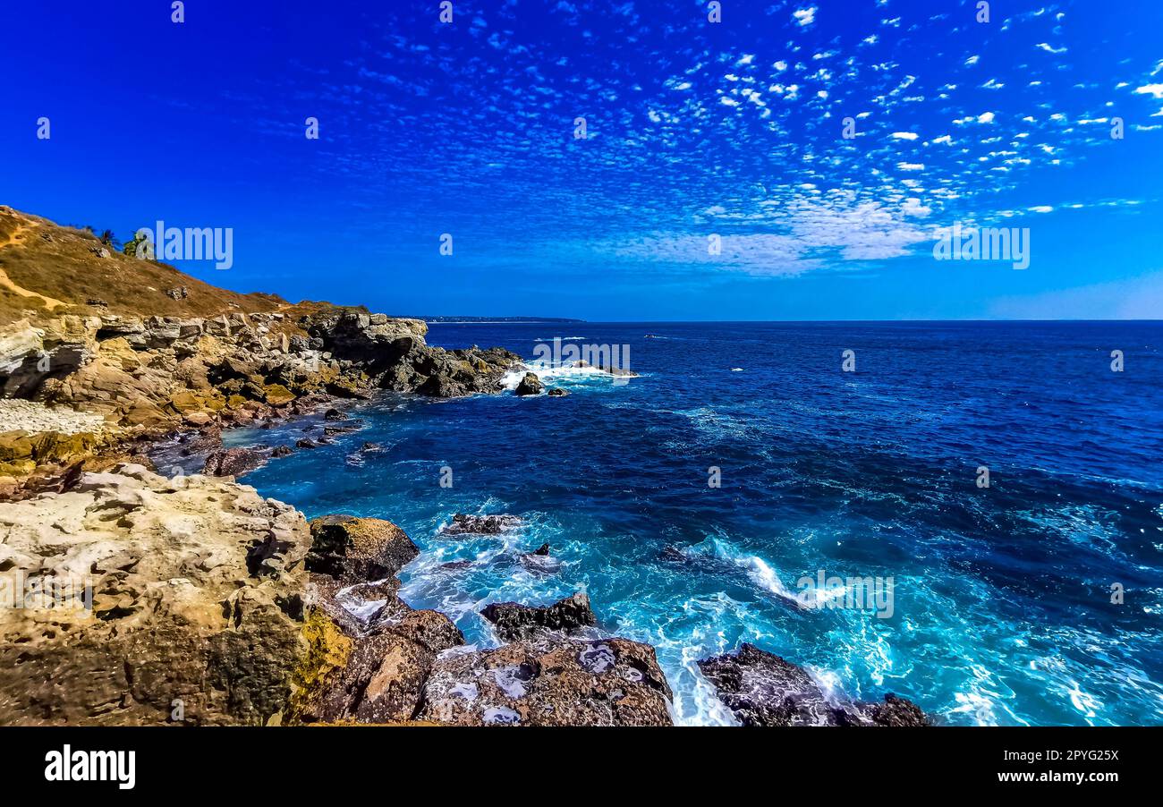 Beautiful rocks cliffs view waves at beach Puerto Escondido Mexico ...