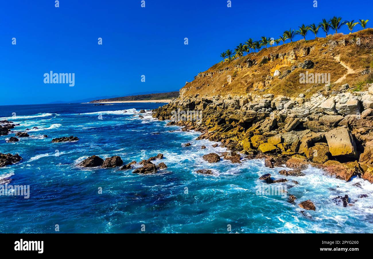 Beautiful rocks cliffs view waves at beach Puerto Escondido Mexico ...
