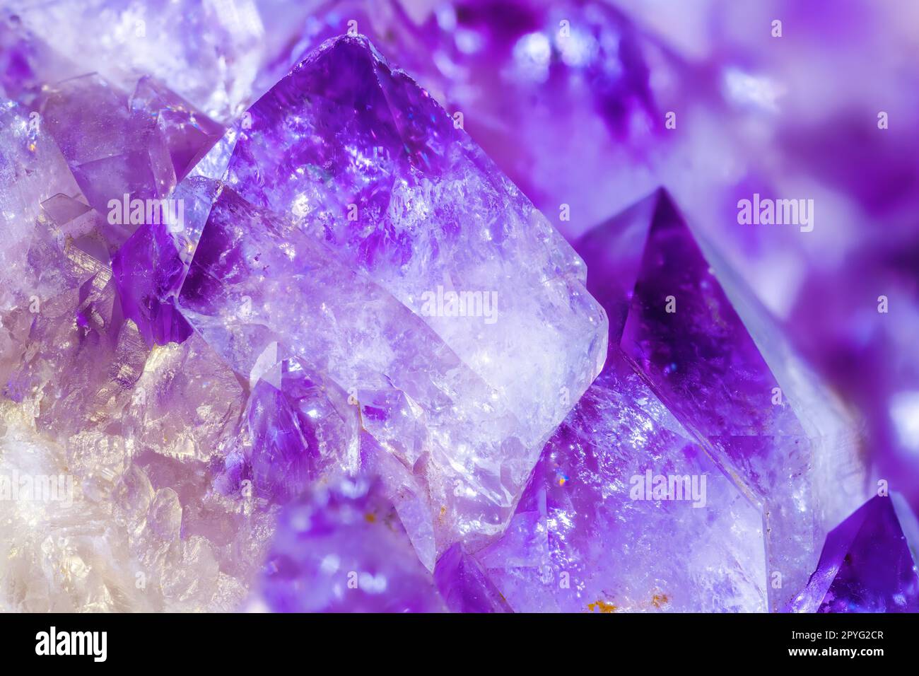 Purple amethyst crystal stone Stock Photo - Alamy