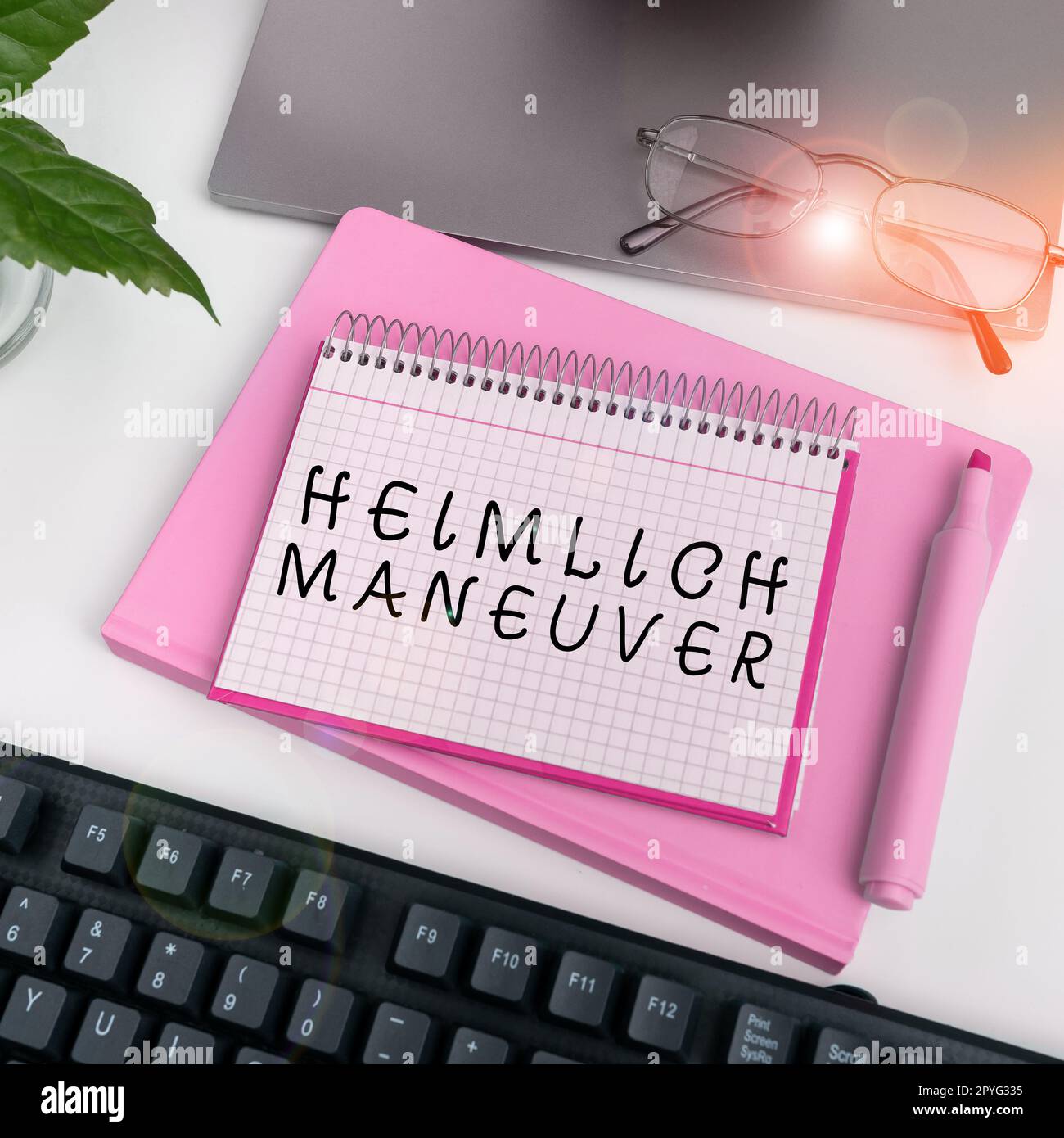 Text caption presenting Heimlich Maneuver. Word Written on application ...