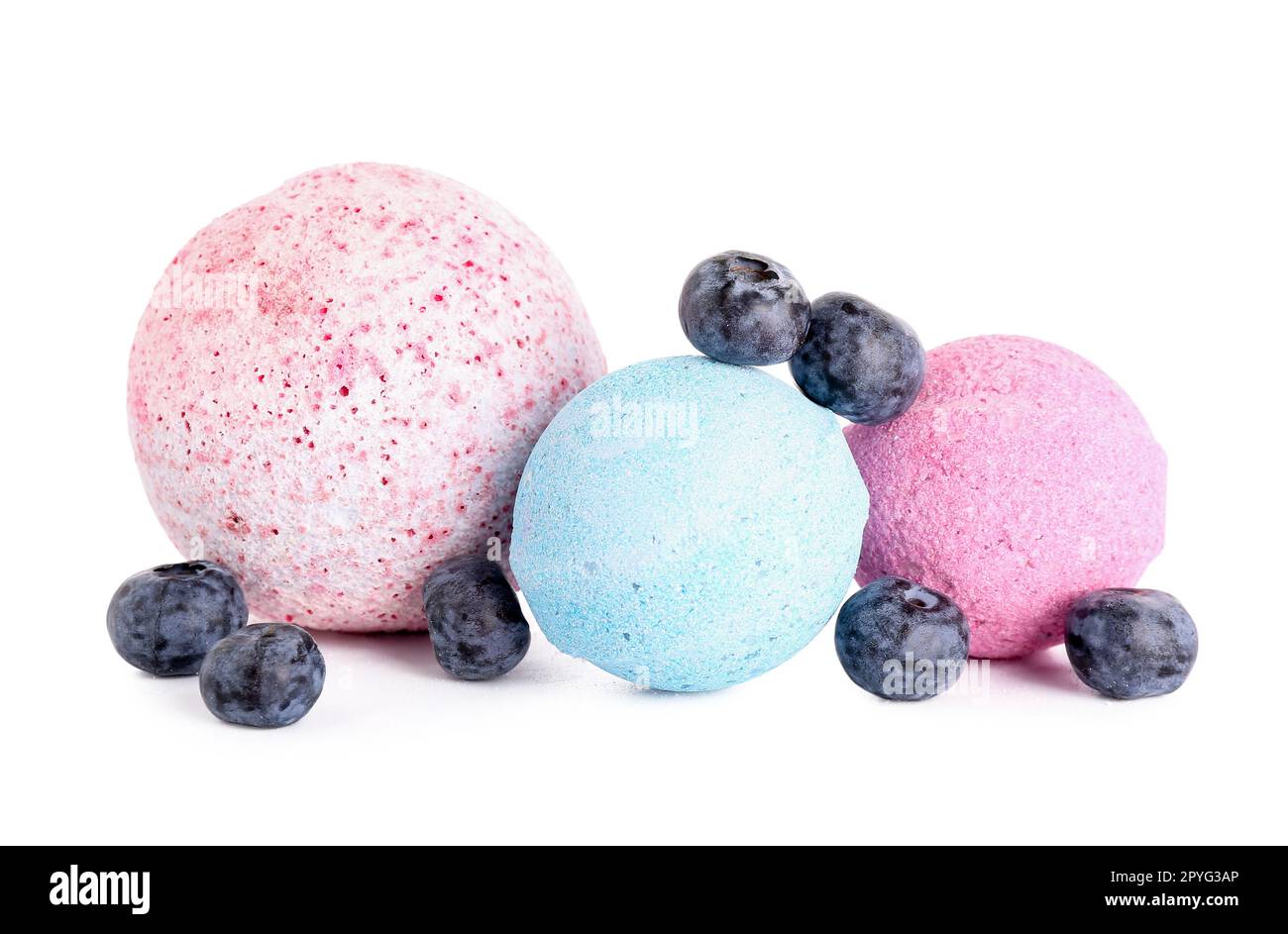 Bath bombs with blueberry on white background Stock Photo - Alamy