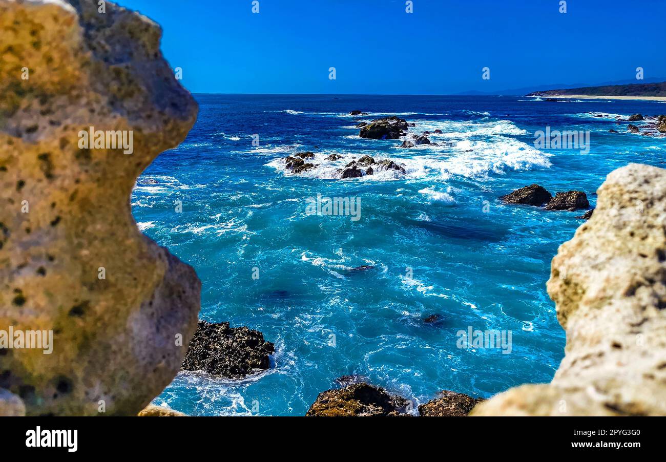 Beautiful rocks cliffs view waves at beach Puerto Escondido Mexico ...