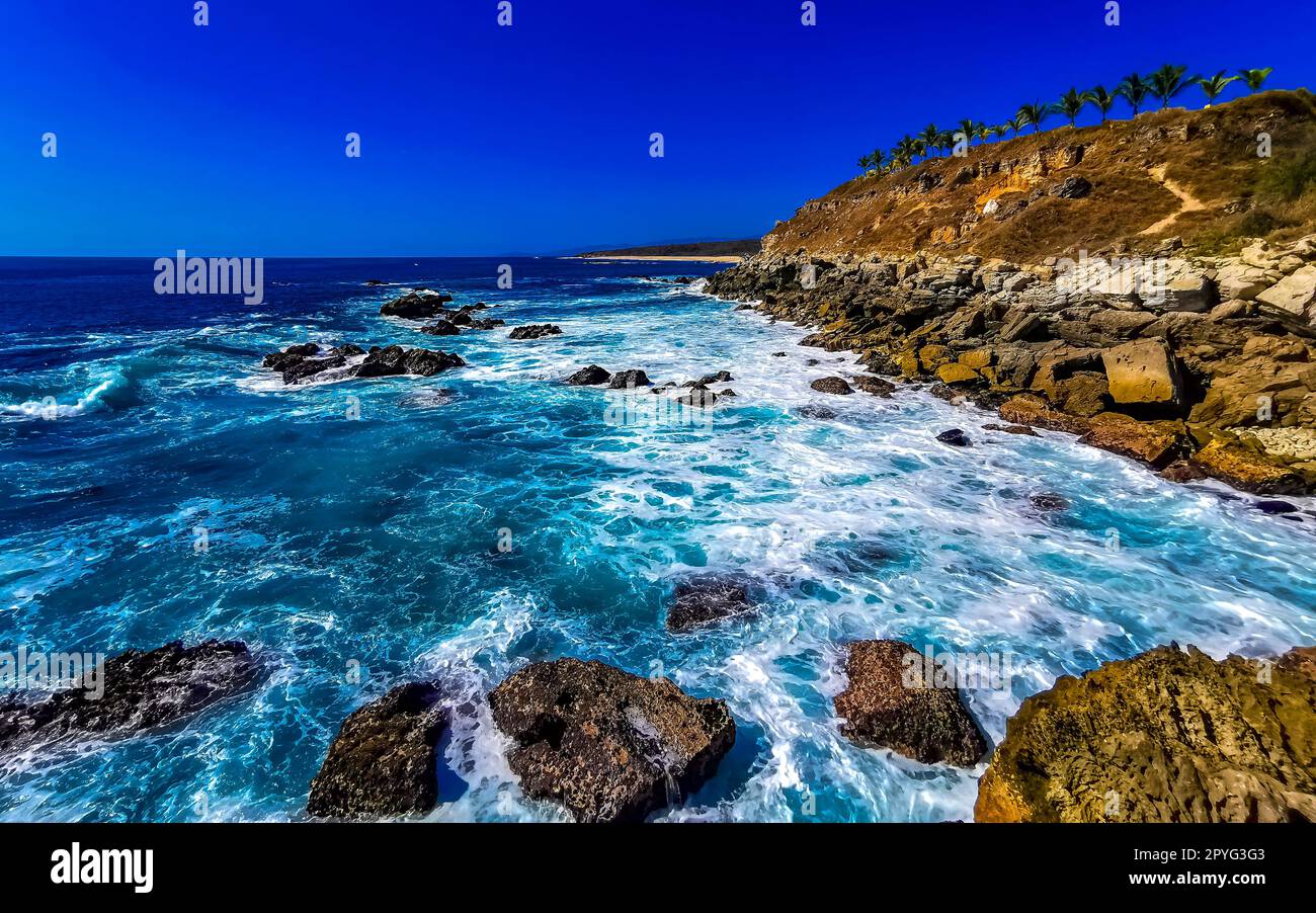 Beautiful rocks cliffs view waves at beach Puerto Escondido Mexico ...