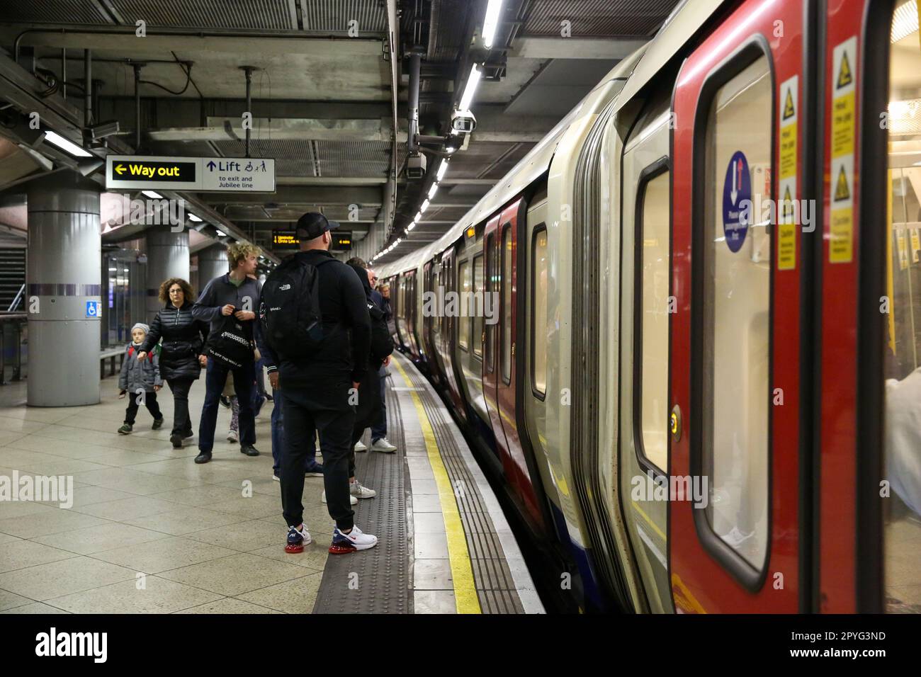 Passengers seen waiting on Westminster underground station platform as ...