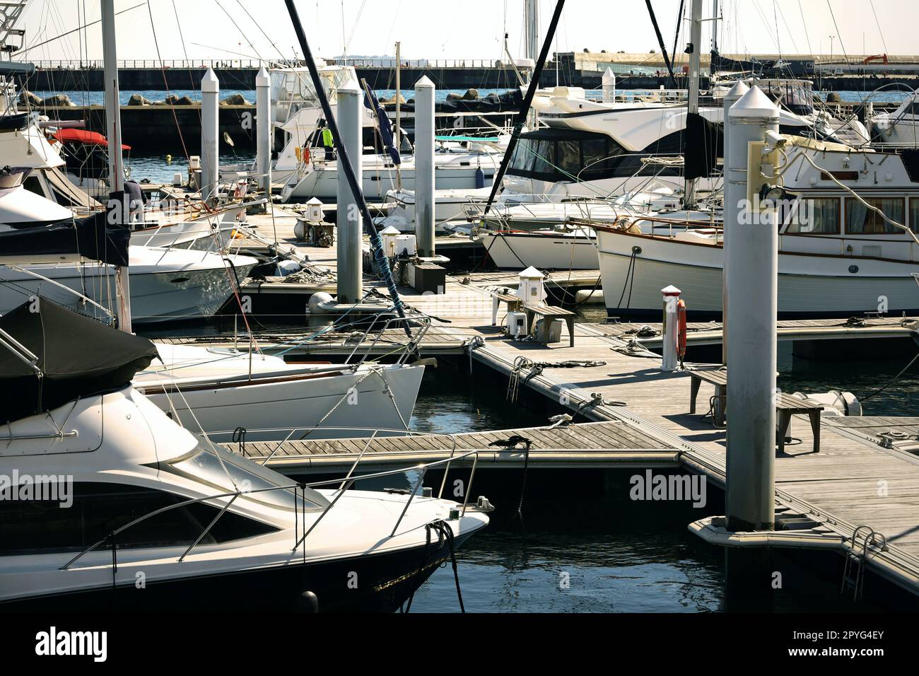 Scenery of a yacht harbor in the calm afternoon Stock Photo - Alamy