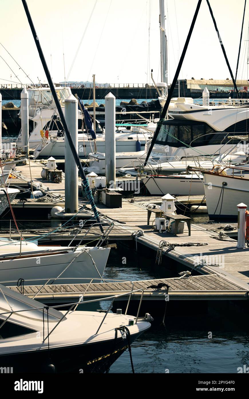 Scenery of a yacht harbor in the calm afternoon Stock Photo - Alamy