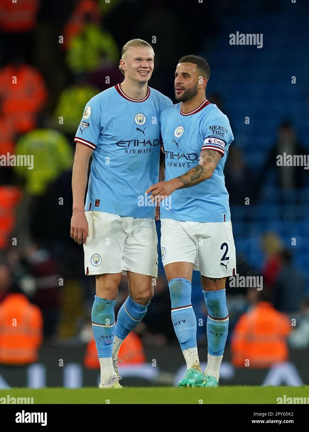 Manchester City's Erling Haaland (left) and Kyle Walker after the final ...