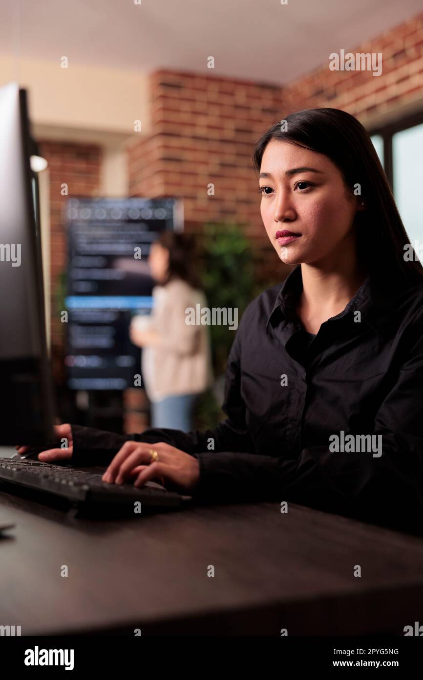Asian Programmer Working With Html Script On Terminal Window Analyzing Javascript Code On
