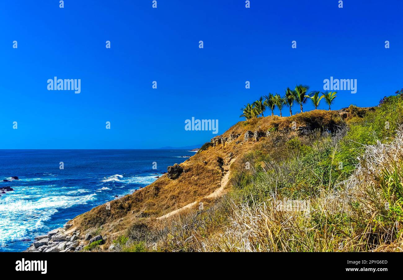 Beautiful rocks cliffs view waves at beach Puerto Escondido Mexico ...