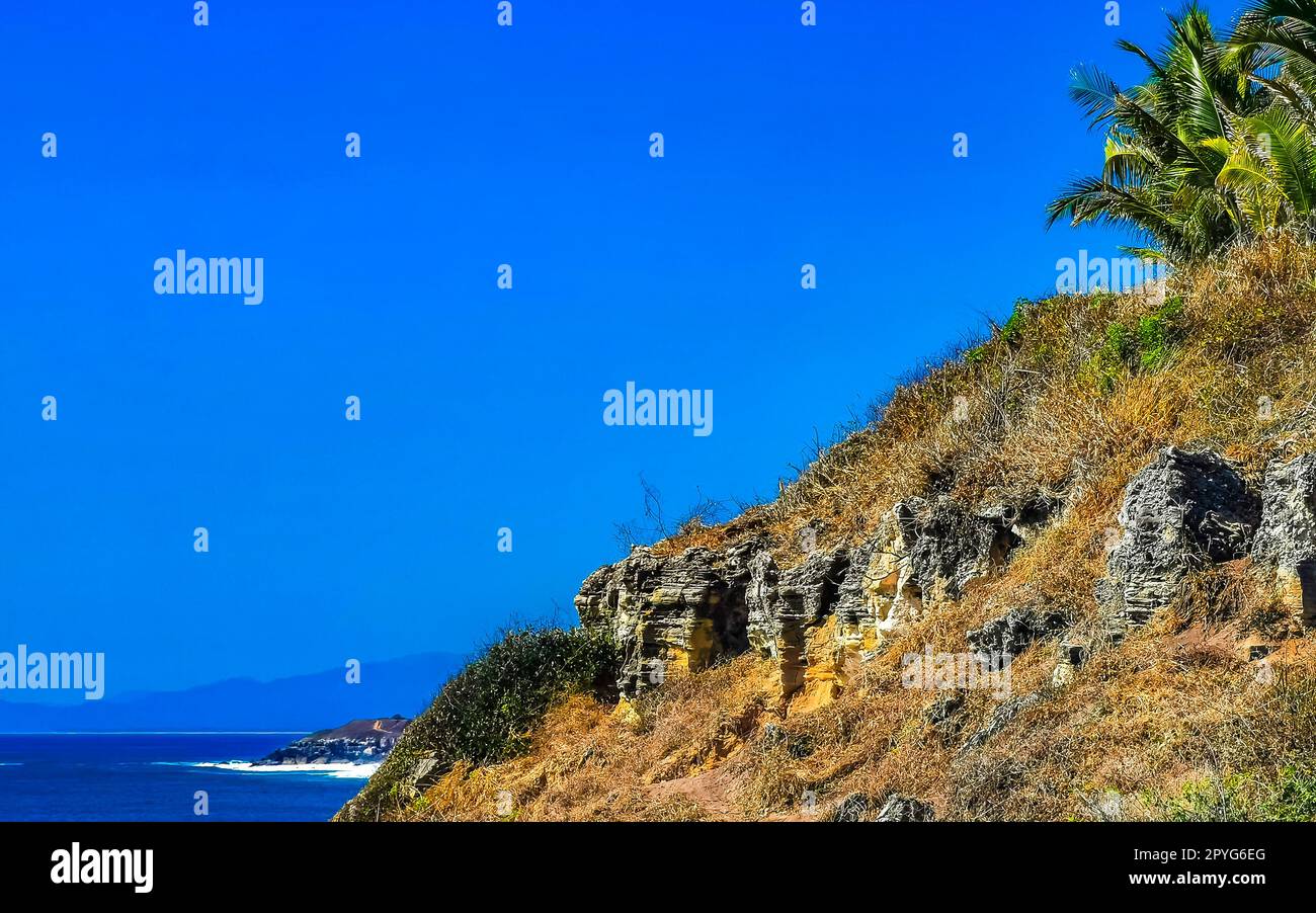 Beautiful rocks cliffs view waves at beach Puerto Escondido Mexico ...