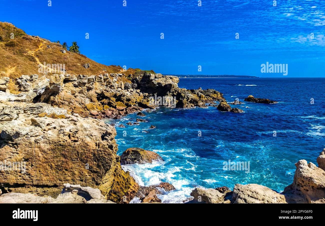 Beautiful rocks cliffs view waves at beach Puerto Escondido Mexico ...