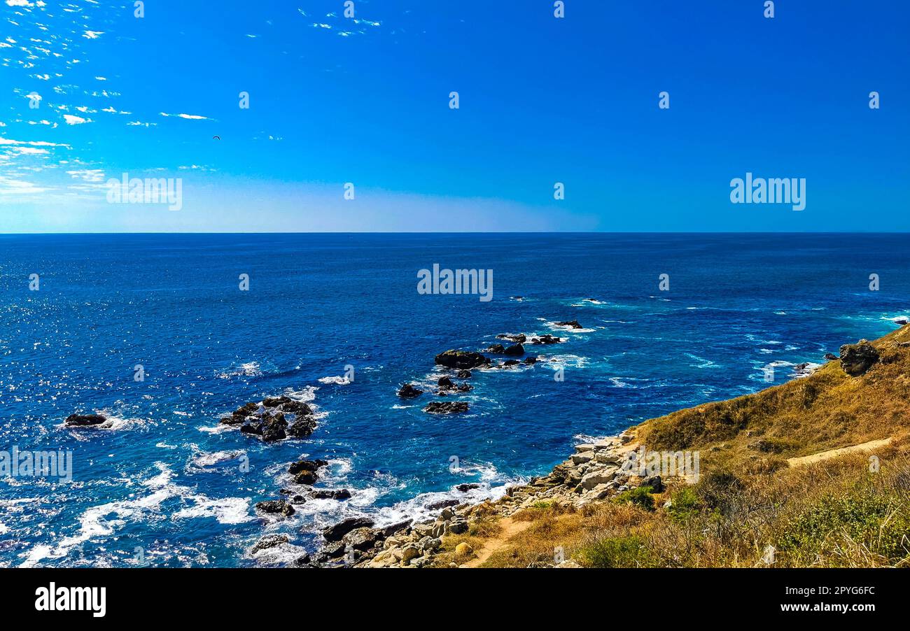 Beautiful rocks cliffs view waves at beach Puerto Escondido Mexico ...
