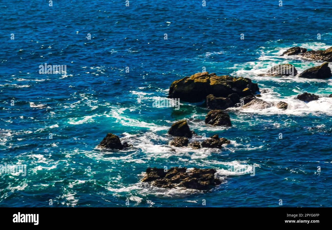 Beautiful rocks cliffs view waves at beach Puerto Escondido Mexico ...