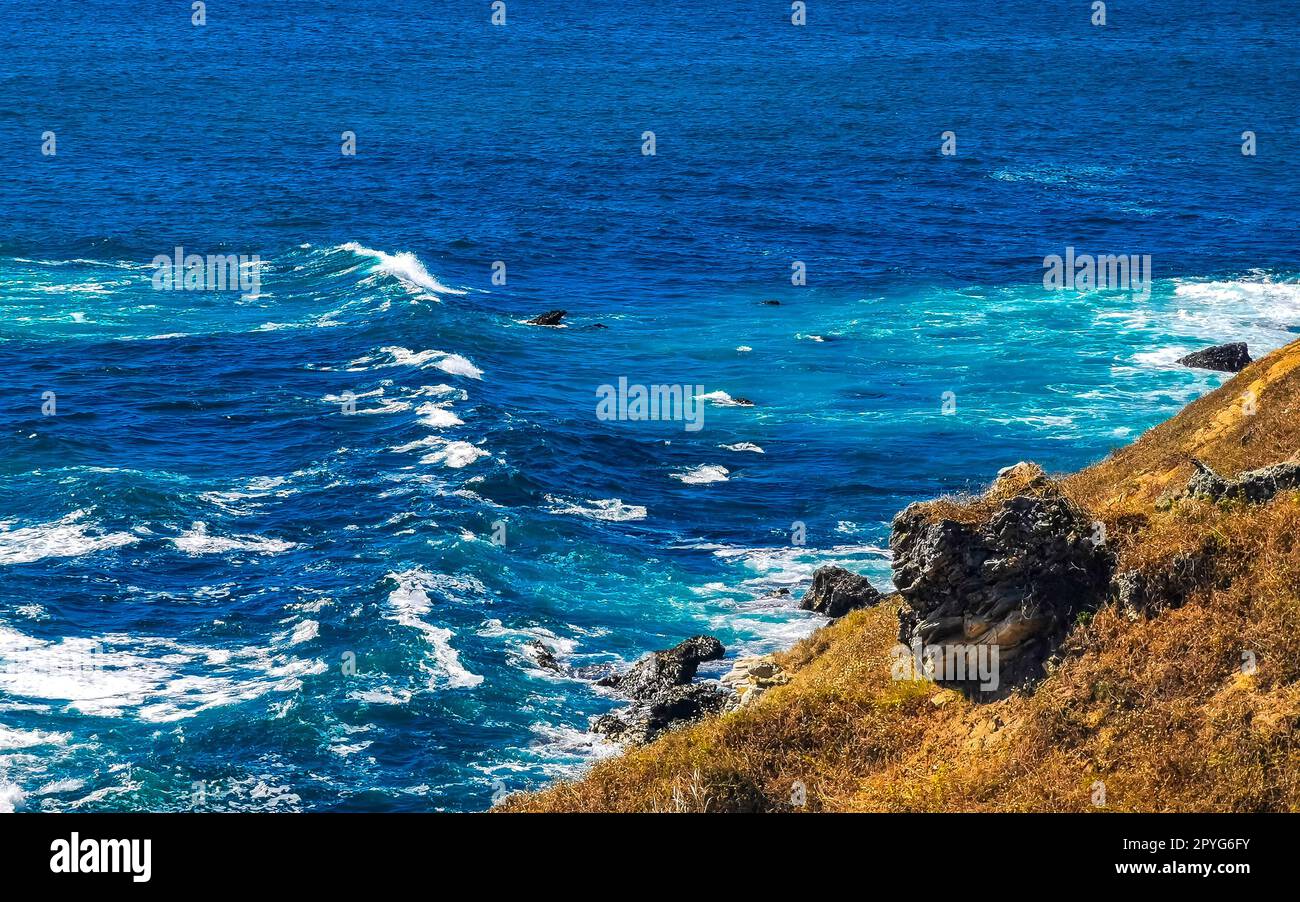 Beautiful rocks cliffs view waves at beach Puerto Escondido Mexico ...
