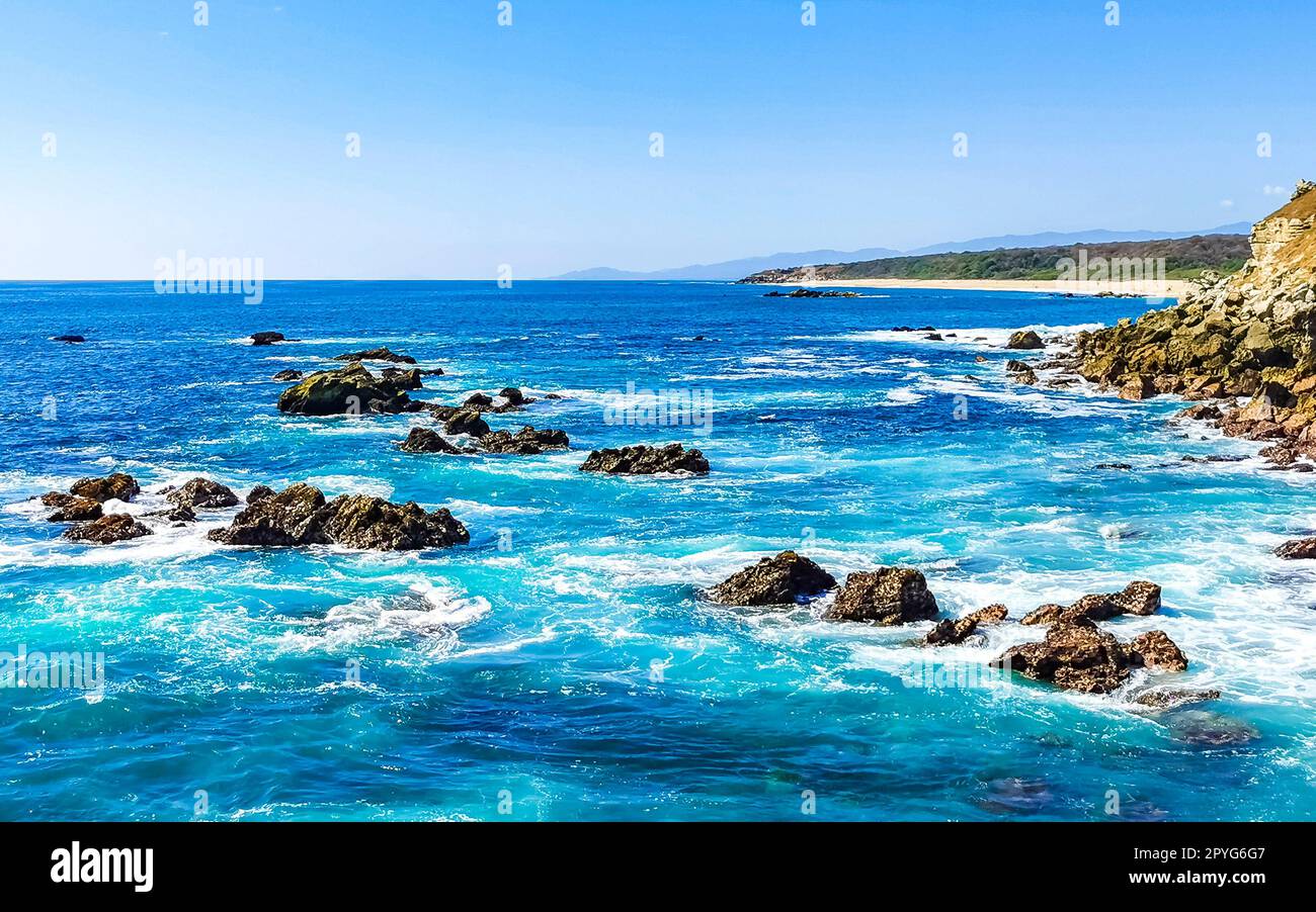 Beautiful rocks cliffs view waves at beach Puerto Escondido Mexico ...