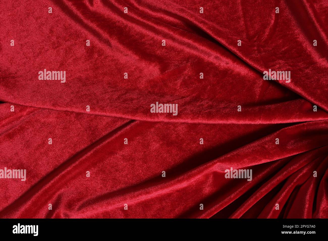 Bundle of Red Velvet Fabric Overhead View Stock Photo - Alamy