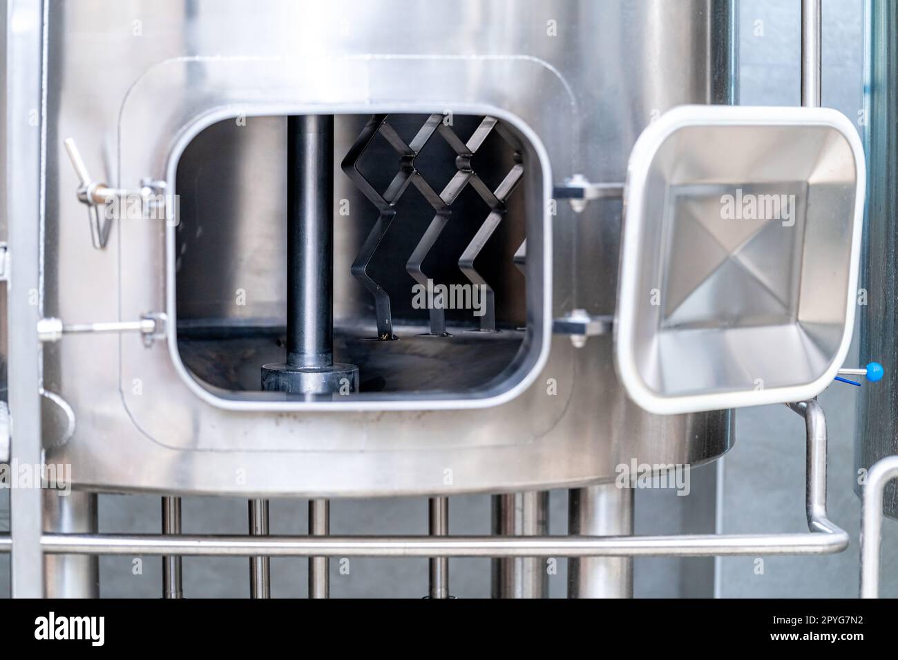 stainless steel boilers and vessels with pipes for brewing beer in a ...