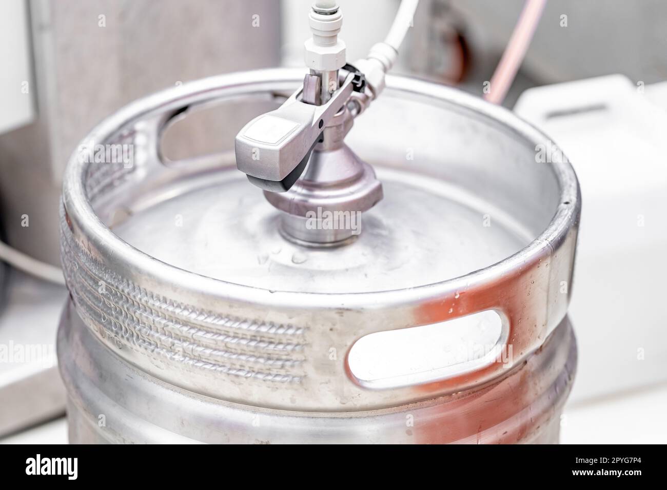 beer connector on aluminium beer barrel in a brewery Stock Photo - Alamy