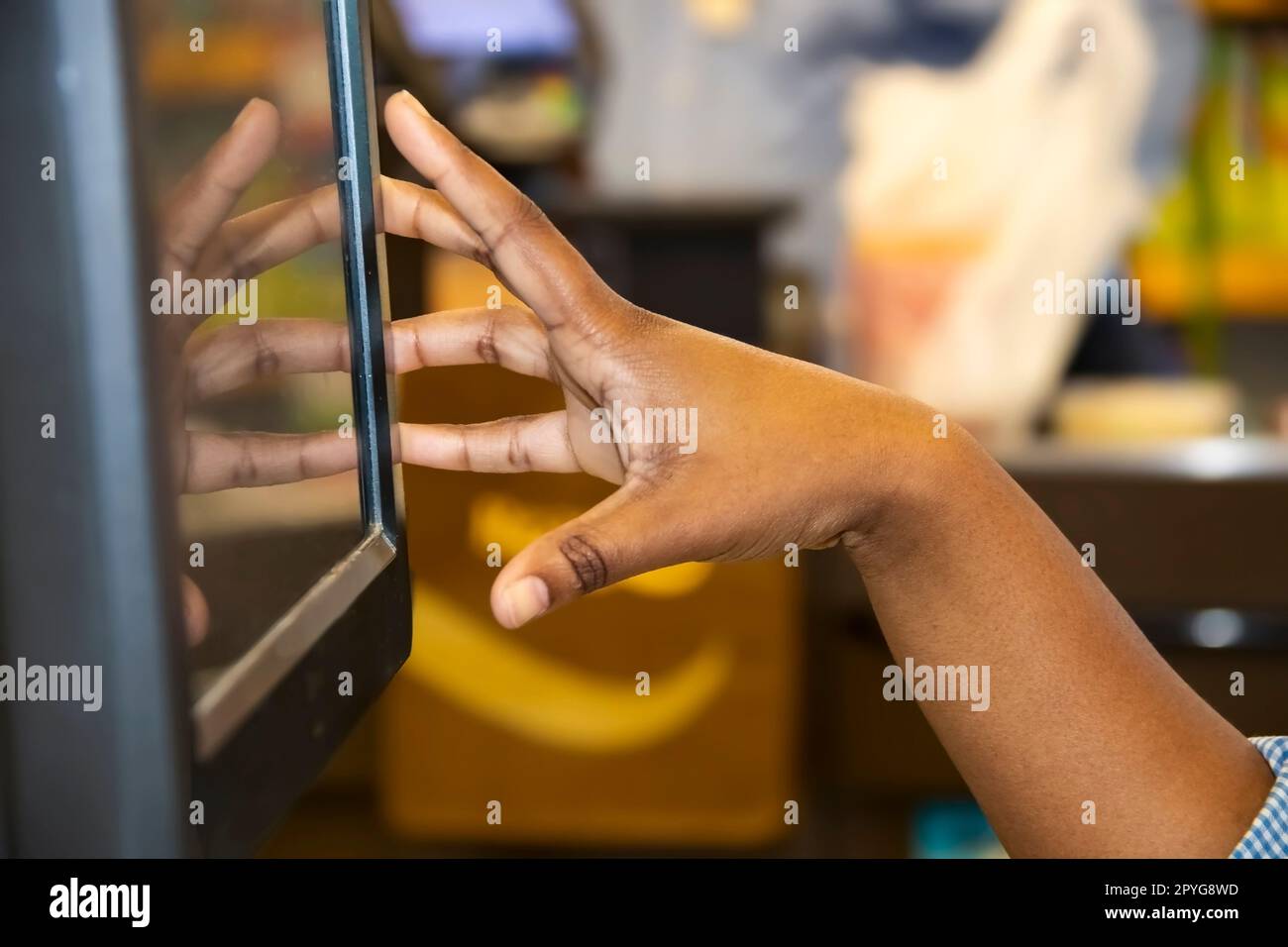 Cashier touchscreen touch screen cash register hi-res stock photography ...