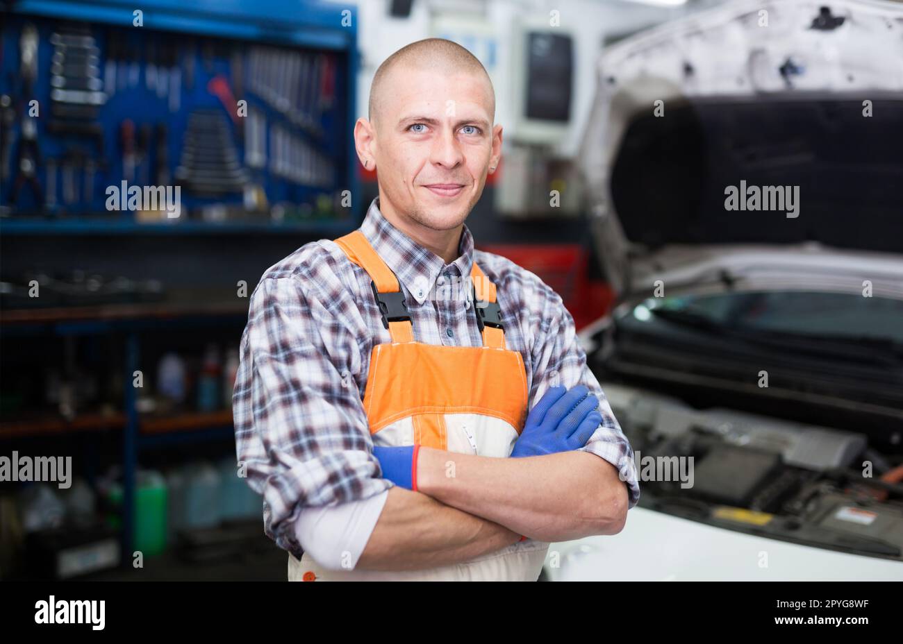 Portrait experienced auto mechanic in hi-res stock photography and ...