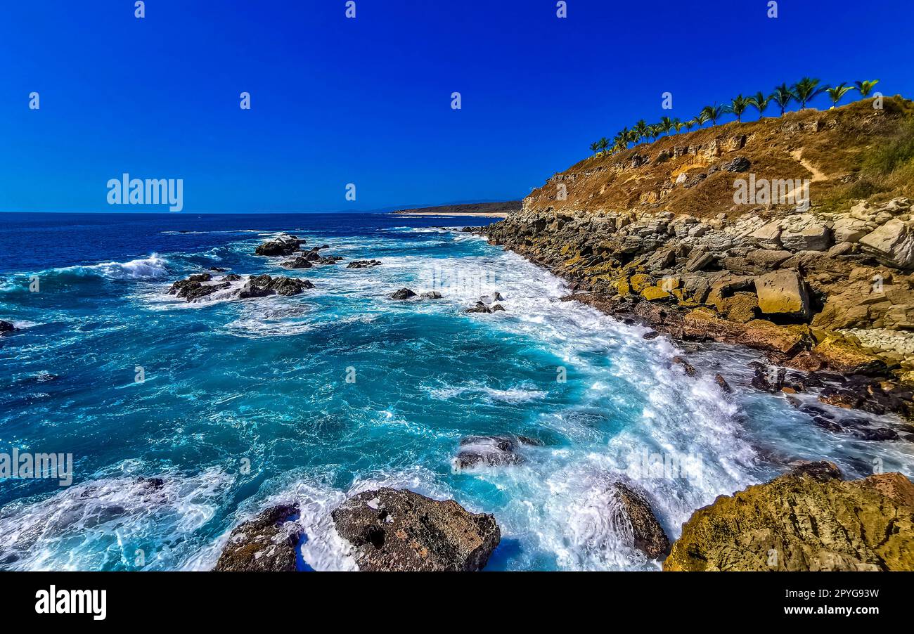 Beautiful rocks cliffs view waves at beach Puerto Escondido Mexico ...