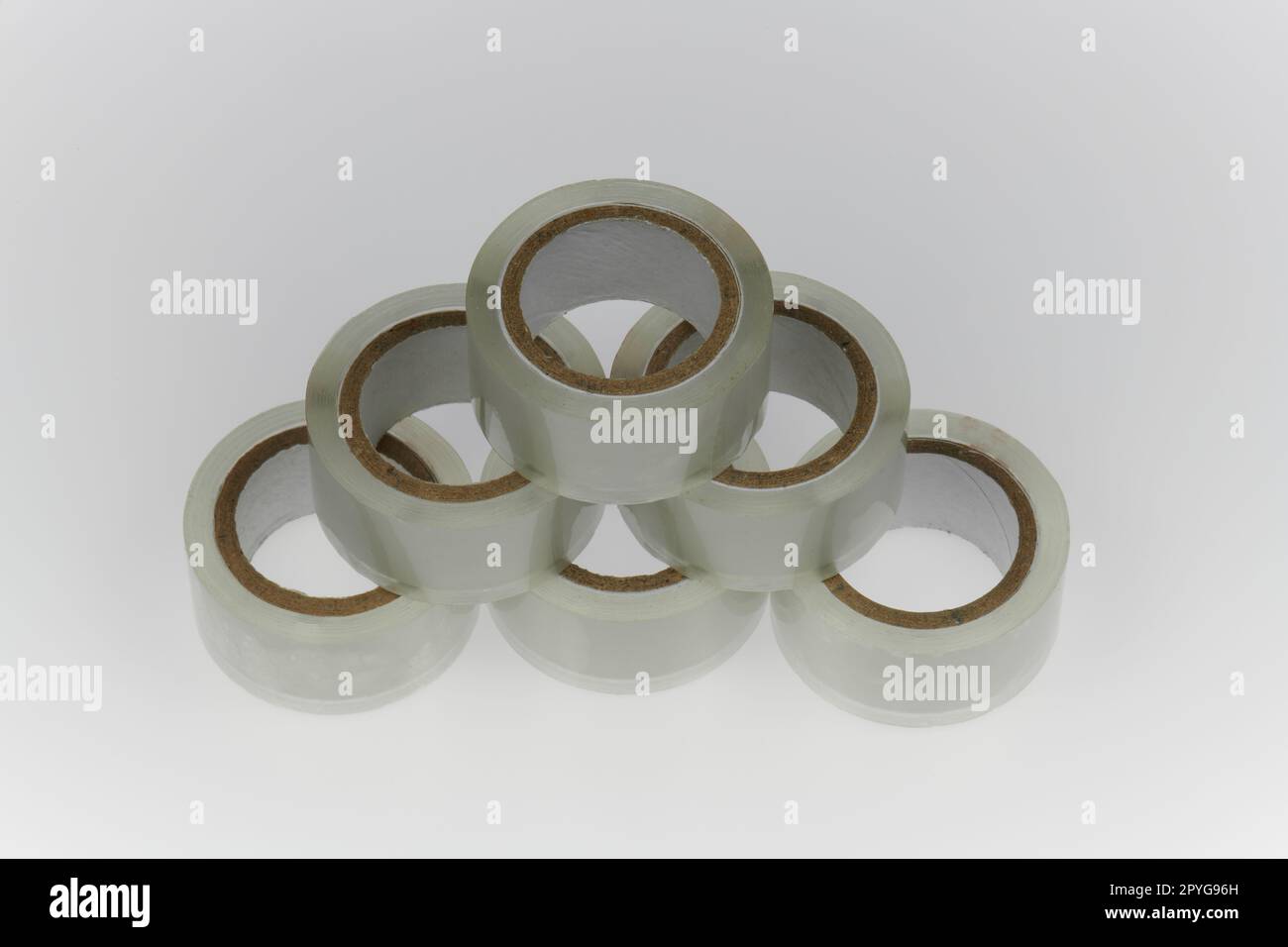 new adhesive gluing plastic film tapes on white Stock Photo - Alamy