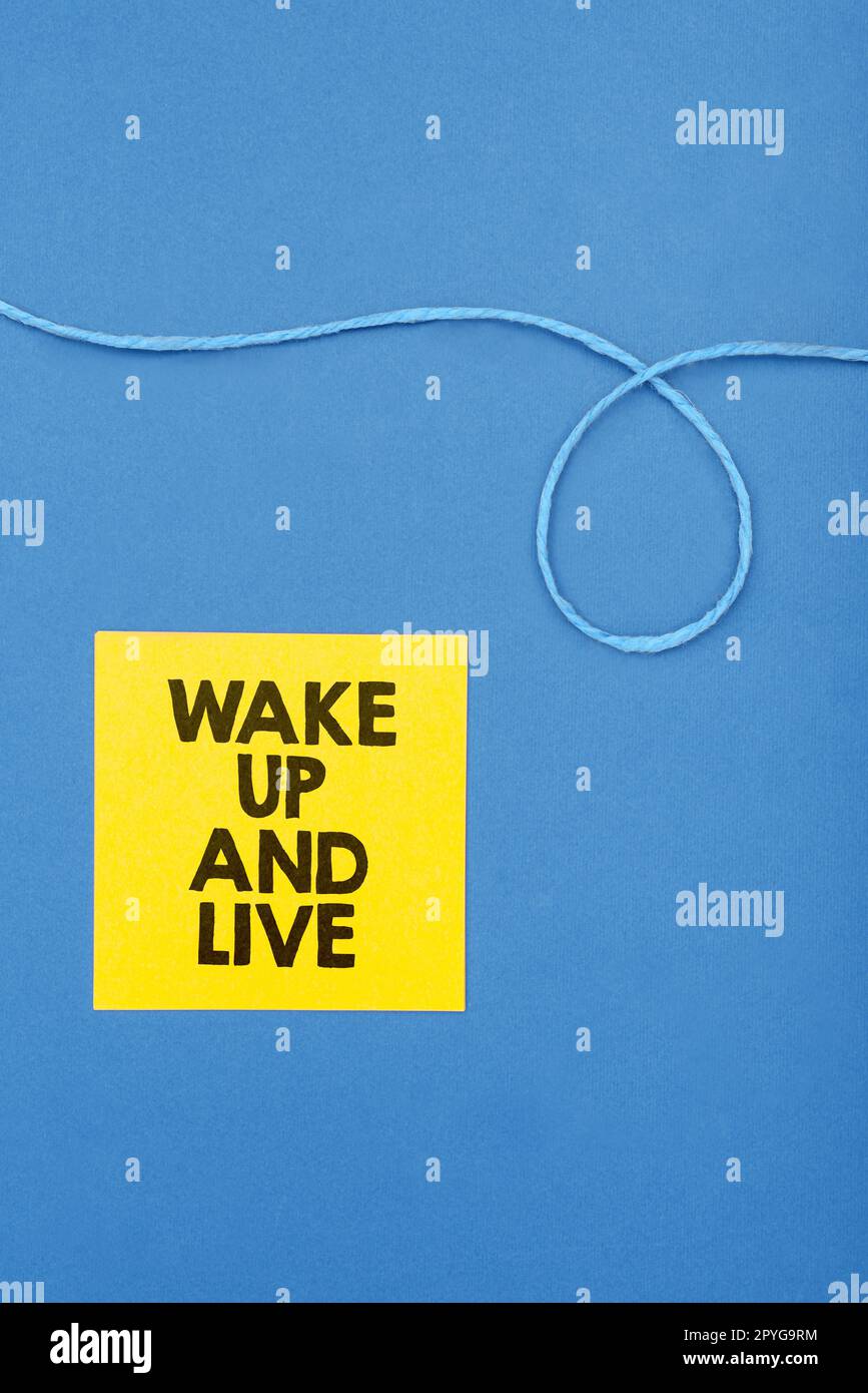 Hand writing sign Wake Up And Live. Concept meaning Motivation ...
