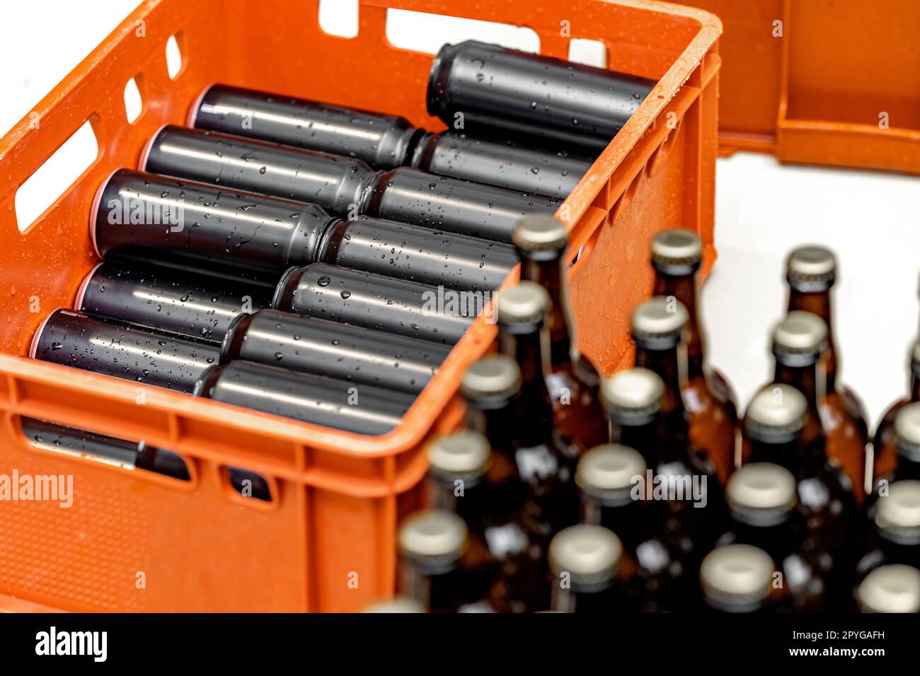 beer bottles and beverage cans in the brewery warehouse Stock Photo - Alamy