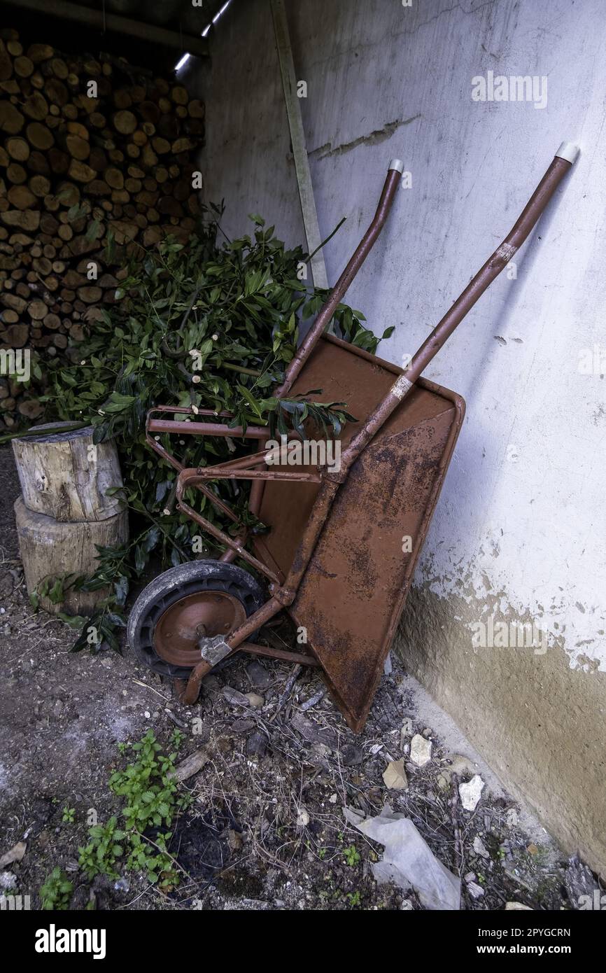 Retro rusty garden barrow hi-res stock photography and images - Alamy