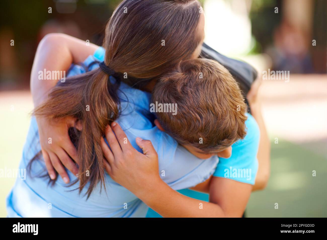Mum and hugging young son and rear view hi-res stock photography and ...
