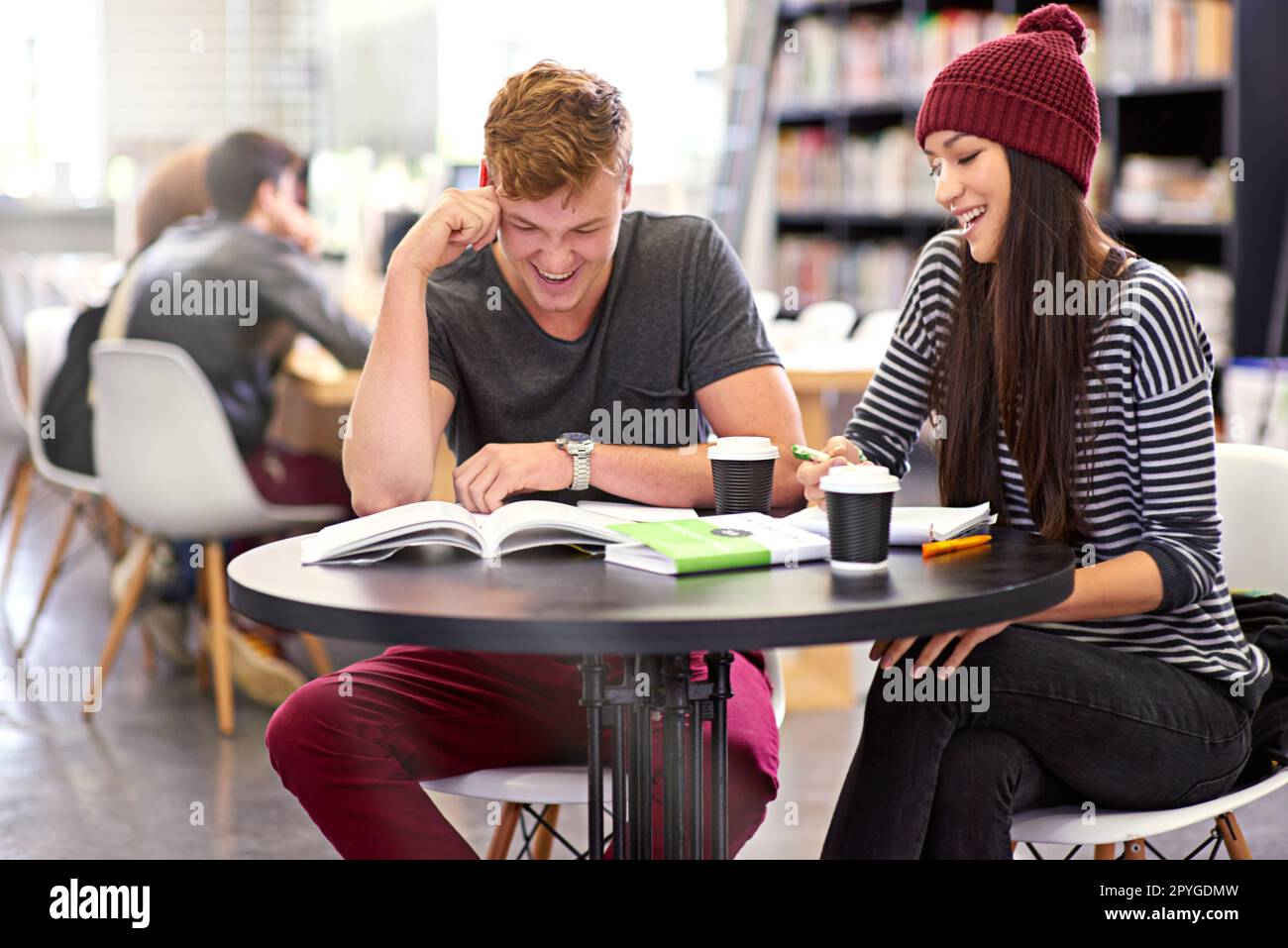 Students writing together library hi-res stock photography and images ...