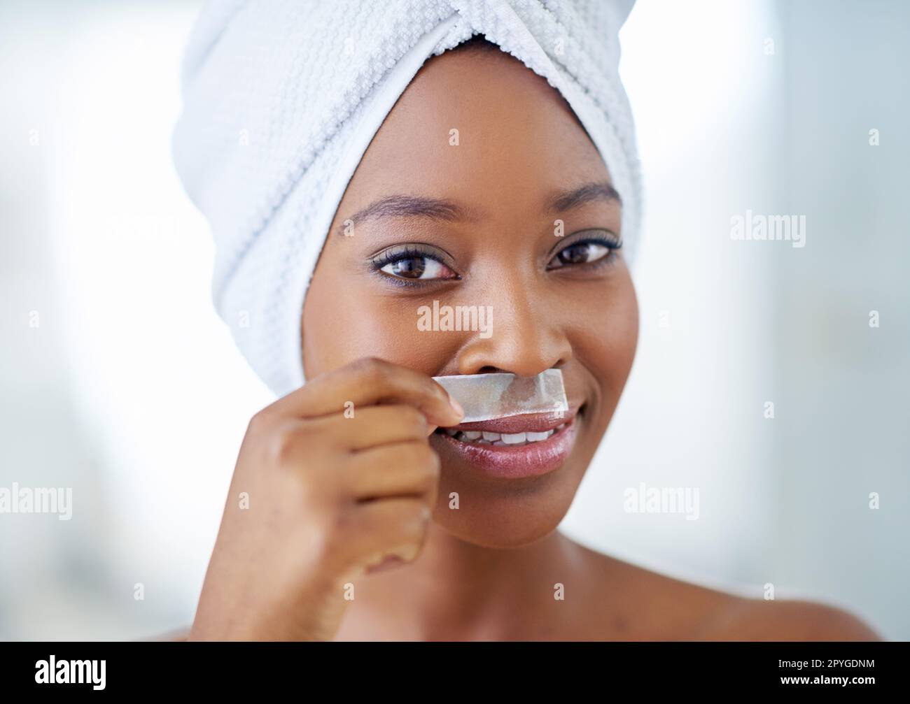 Waxing works. a beautiful young woman during her daily beauty routine ...