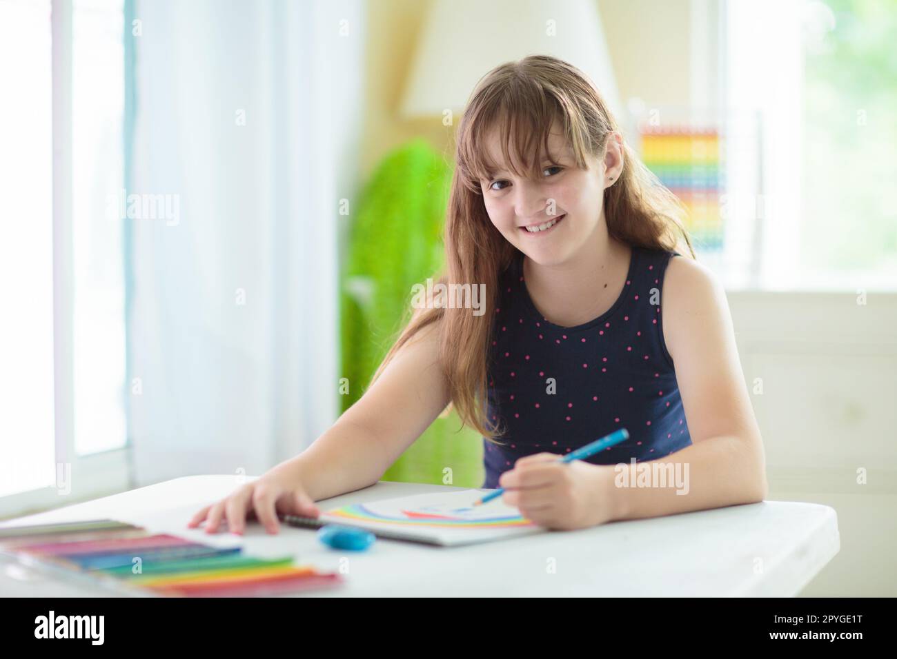 Child drawing. School kid painting a picture. Little boy with colorful ...