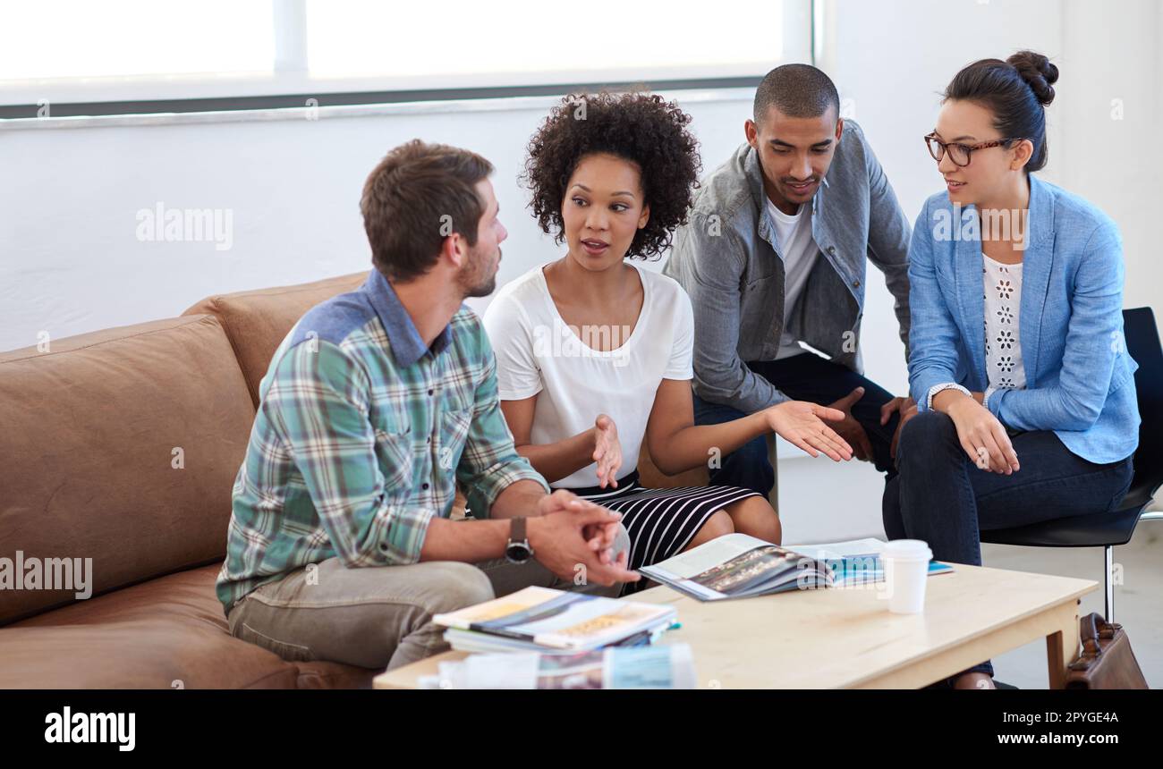 Diverse group people sitting couch hi-res stock photography and images ...