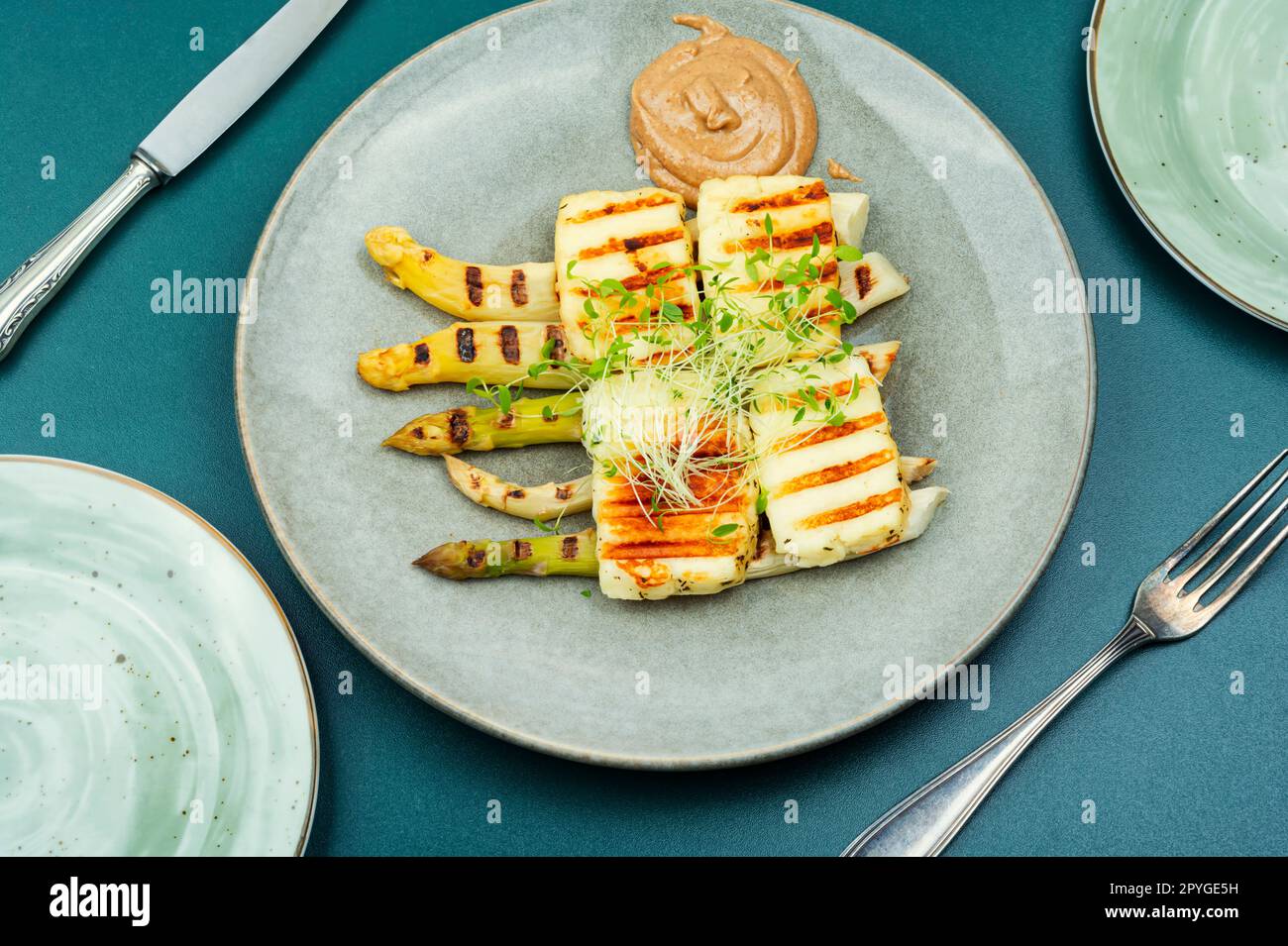 White asparagus with halloumi cheese Stock Photo - Alamy